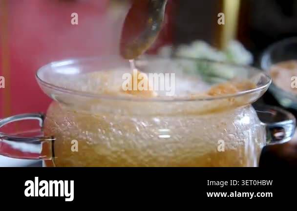 Shrimp are added to boiling water, seasoned with salt and cooked until ...