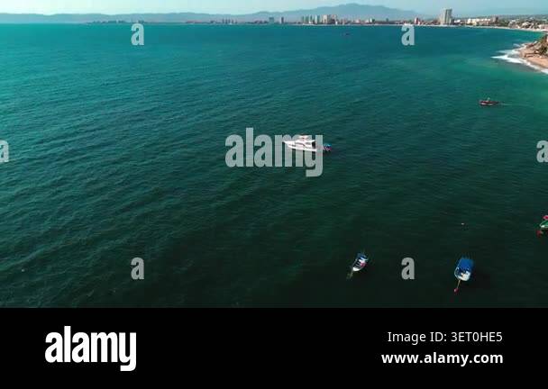 Aerial near-zenith drone captures a small boat moving serenely through ...