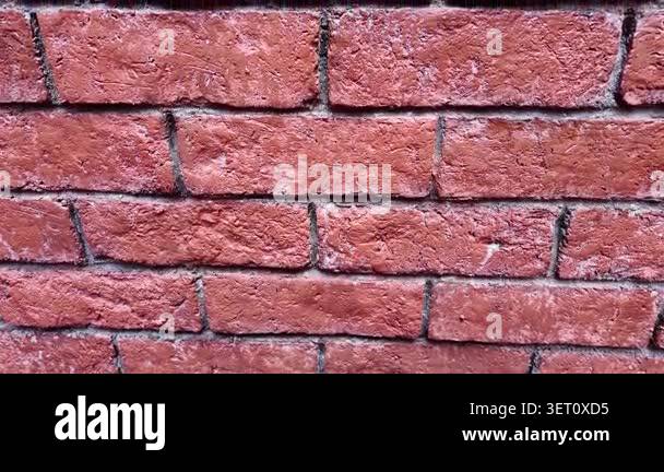 Textured Background of a Solid Red Brick Wall Facing Stock Video ...