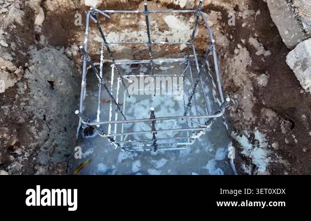 Steel Rebar Cage Inside Foundation Pit with Concrete Stock Video ...