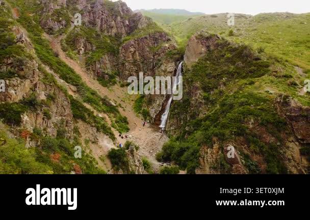 Wide angle drone footage smoothly flying backwards from the Medvezhiy ...