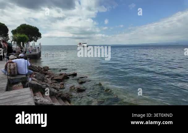 Bardolino, Italy - May 14, 2026 - People enjoying a scenic ferry ride ...