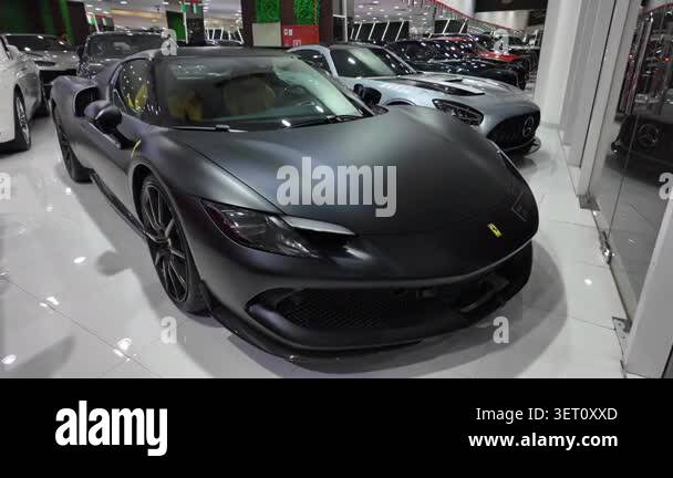 Dubai, UAE - June 17, 2026: Luxury car at automotive showroom Stock ...