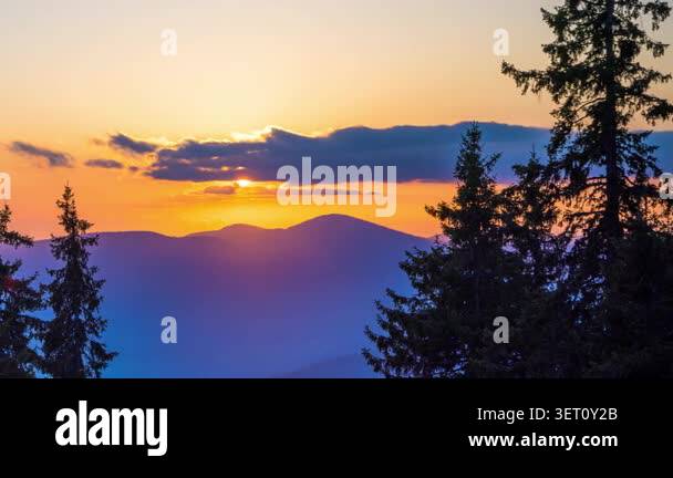 A mountain valley with mountain peaks of the Rhodope Mountains covered ...