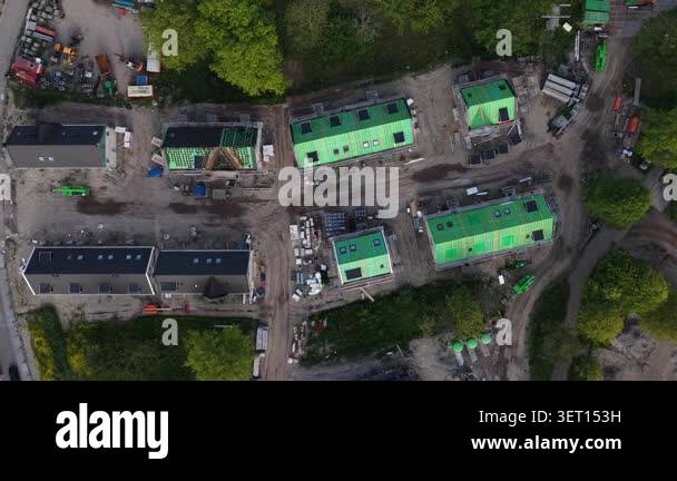 Aerial top down perspective of a new residential area under development ...
