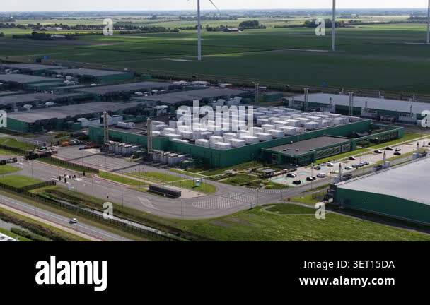 Aerial drone view of a large computing center housing servers, cloud ...