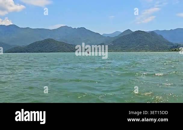 Panoramic video of a boat traveling across Skadar Lake in Montenegro ...