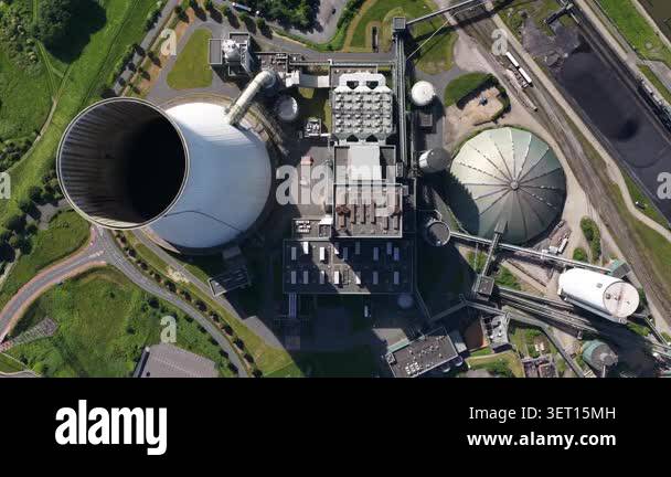 High angle aerial view of a coal fired power plant with its cooling ...