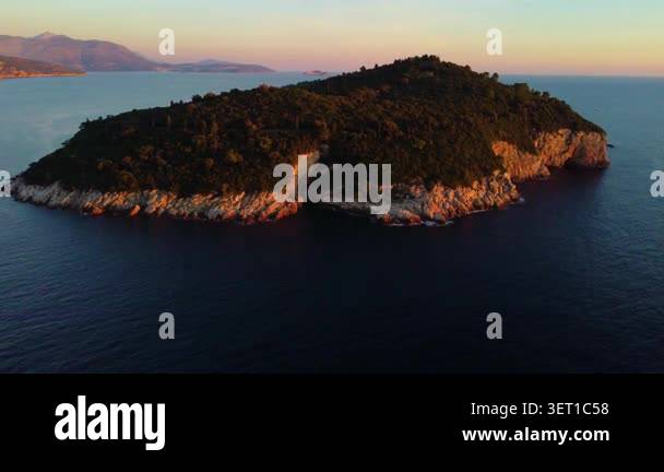 Golden hour sunlight illuminating the beautiful rocky cliffs of lokrum ...