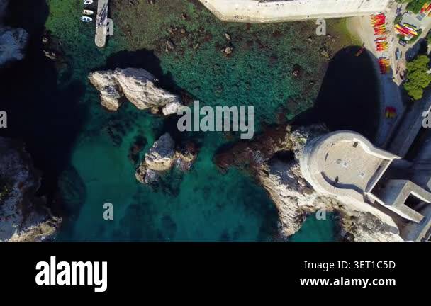 Aerial top down view of dubrovnik's west harbour with turquoise ...