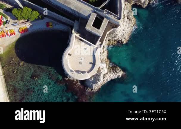 Overhead aerial drone footage rotating above the historic fort bokar ...