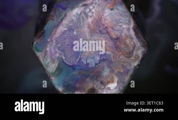 Ink splatter. Color glitter mix. Defocused blue purple bright gem water ...