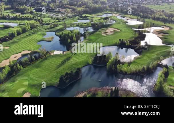 Panoramic golf course view with lakes and green forest Stock Video ...