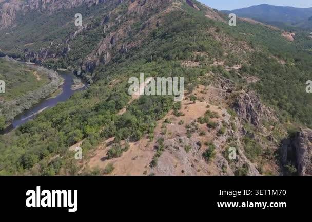 Aerial drone view of scenic mountains and winding Arda River canyon in ...