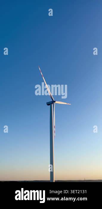 wind turbine on blue sky Stock Video Footage - Alamy