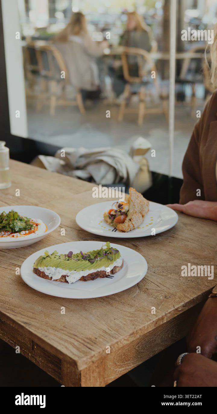 Anonymous waiter serving clients on a restaurant Stock Video Footage ...