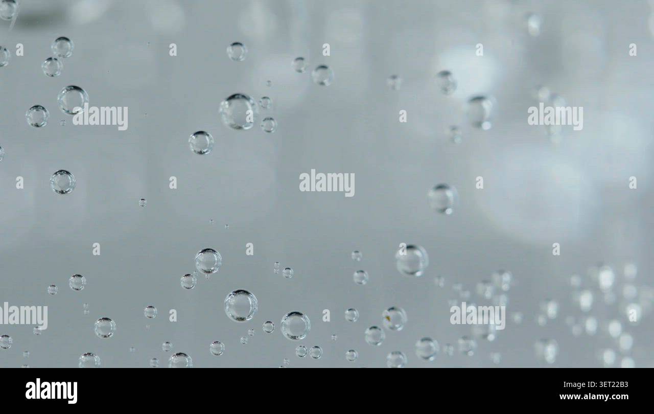 Soda water forms bubbles on the inside of a glass Stock Video Footage ...