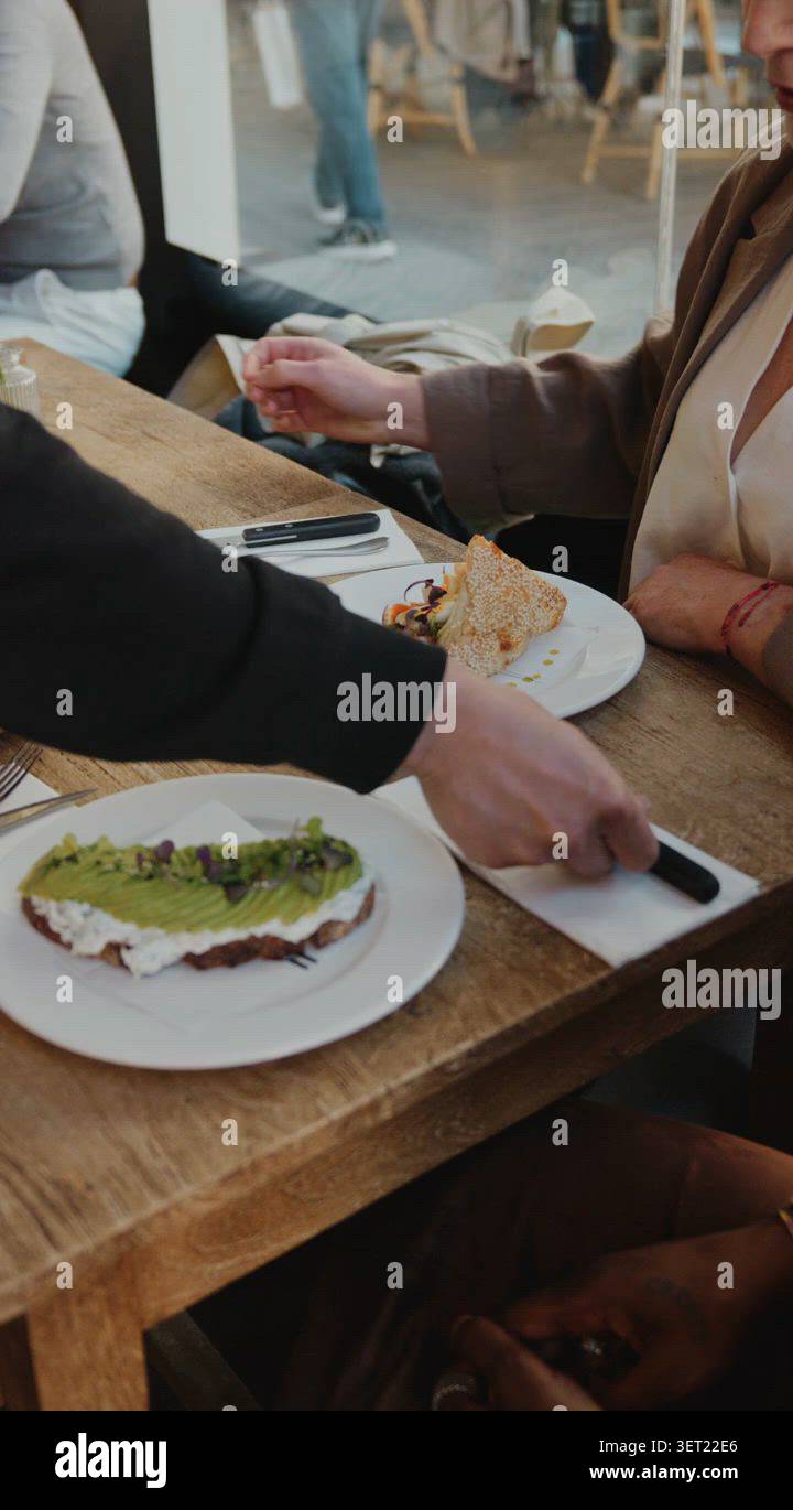 Anonymous waiter serving clients on a restaurant Stock Video Footage ...