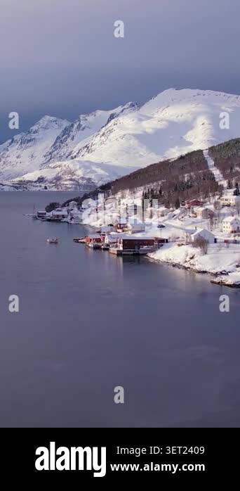 Aerial drone view of fishing boat in the port of northern Norway ...
