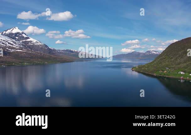 Discover stunning aerial views of Tromso fjord, showcasing the majestic ...