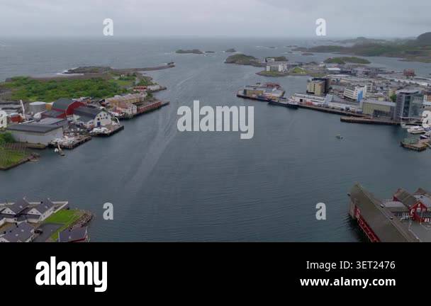 Aerial view of Lofoten Islands harbor in Norway showing industrial port ...