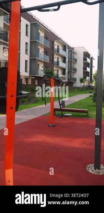 Empty modern outdoor gym in a residential complex courtyard. Public ...