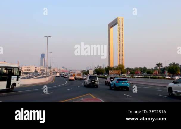 9 January 2026, Dubai, UAE: Modern cars and buses driving on a busy ...