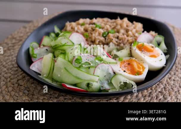 Cutting Soft Boiled Egg in Healthy Breakfast Bowl Close Up Stock Video ...