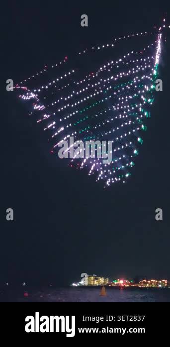 10 January 2026, Dubai, UAE: Colorful swarm of drones flying in ...