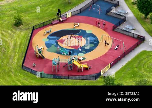 Aerial view of a colourful childrens playground in a public park ...
