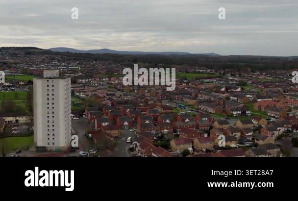 Aerial view of residential housing estate with prominent tower block ...