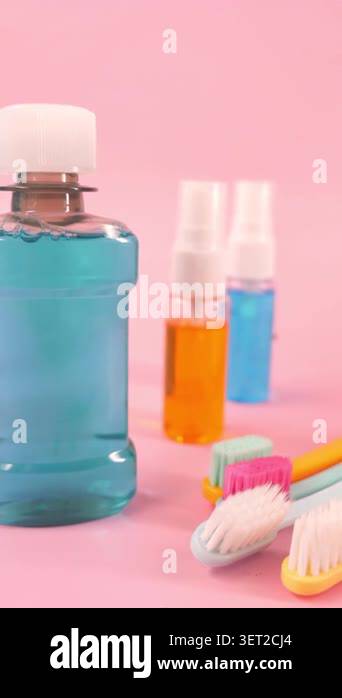 mouthwash liquids on a colorful background Stock Video Footage - Alamy