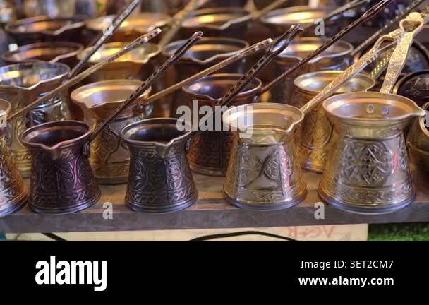 People look at coffee pots for sale at a market in Istanbul Stock Video ...