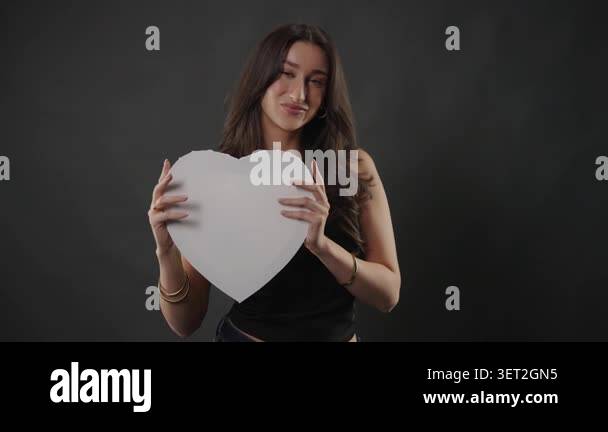 Love and affection concept, beautiful young woman holding white heart ...