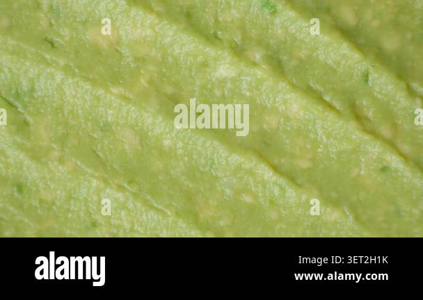 Full frame texture of green homemade guacamole sauce top view Stock ...