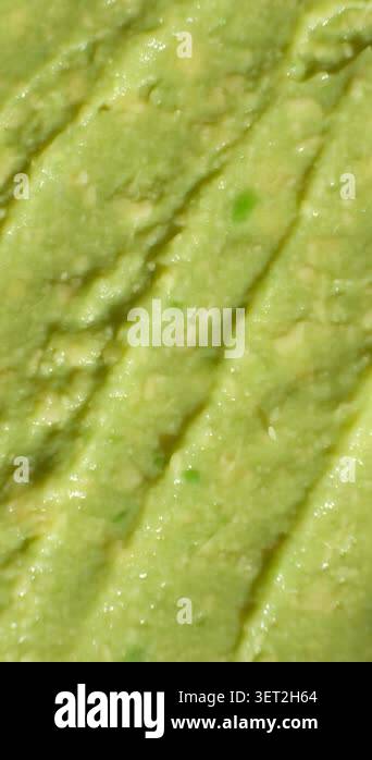 Full frame texture of green homemade guacamole sauce top view Stock ...