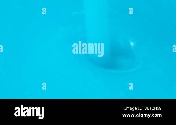 Abstract full frame background of blue liquid soap texture with micro ...