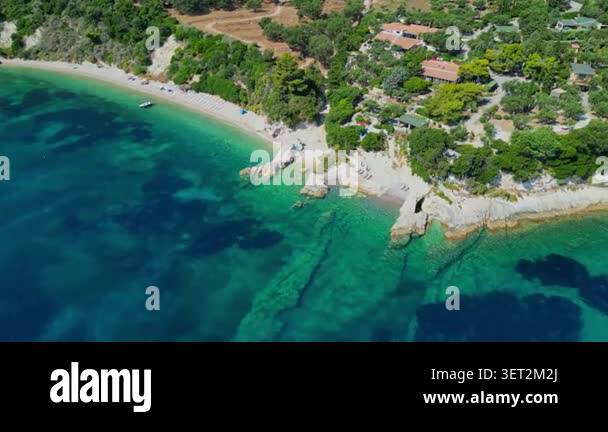 High angle view of tourists swimming and relaxing in crystal clear ...