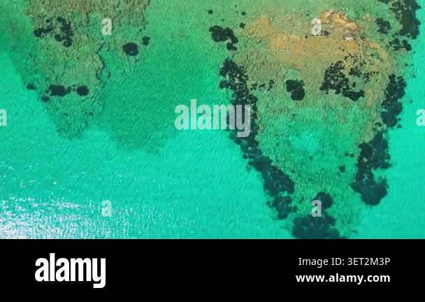 High angle view of tourists swimming and relaxing in crystal clear ...