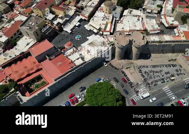 Panoramic aerial drone shot of the medieval Marine Gate with two towers ...