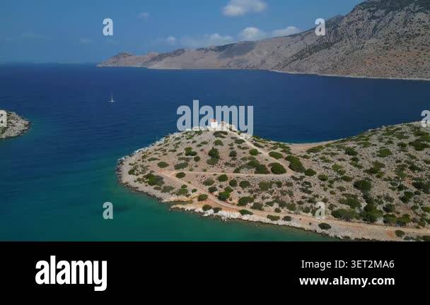 Scenic aerial drone shot of Panormitis Bay on Symi island, Greece ...