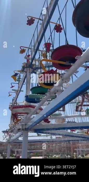 Colorful water park play structure with buckets spraying water Stock ...
