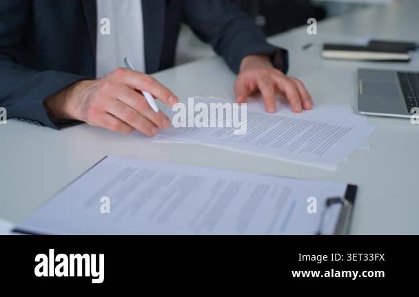 Close up unrecognizable man writing business report paperwork male ...