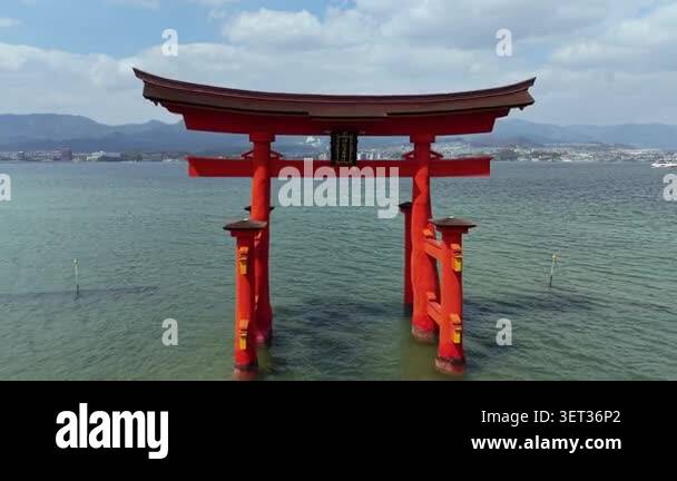 An aerial view of the iconic red floating torii gate of Itsukushima ...