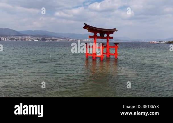 An aerial view of the iconic red floating torii gate of Itsukushima ...