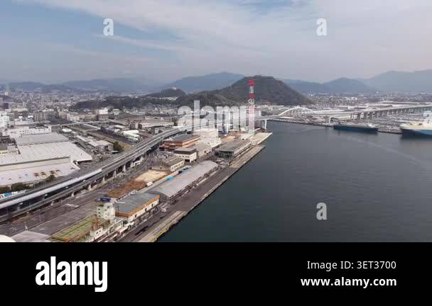 An aerial view of the city, harbour and industrial port of Hiroshima by ...