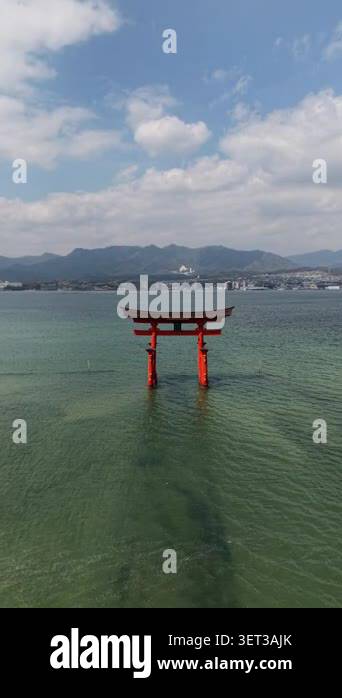 An aerial view of the iconic red floating torii gate of Itsukushima ...