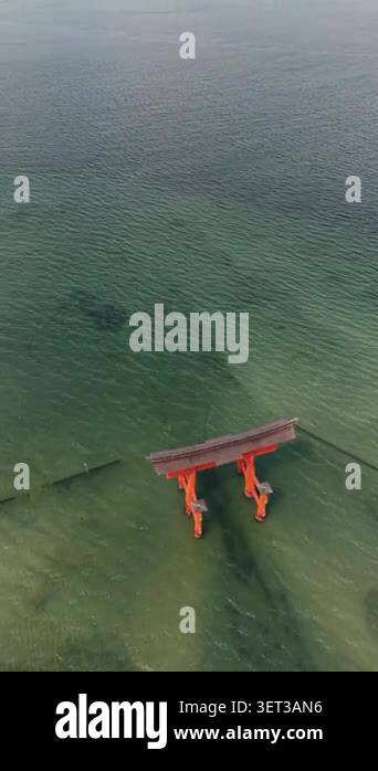 An aerial view of the iconic red floating torii gate of Itsukushima ...