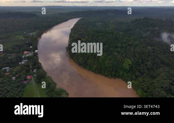 Aerial Shot of WIde Brown river Kinabatangan, a living corridor of ...