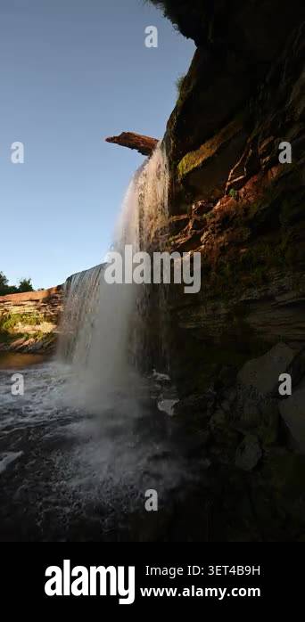 Scenic waterfall closeup in the sunset rays. Jagala Waterfall Stock ...